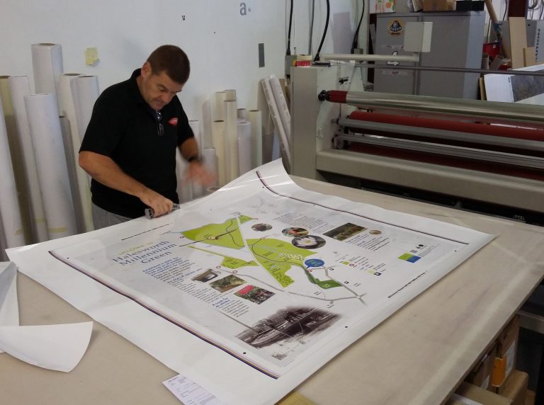 laminating the sign – Halesworth Millennium Green